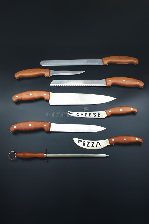 Different Kitchen Knives a on Black Surface. Includes Carving, Paring ...