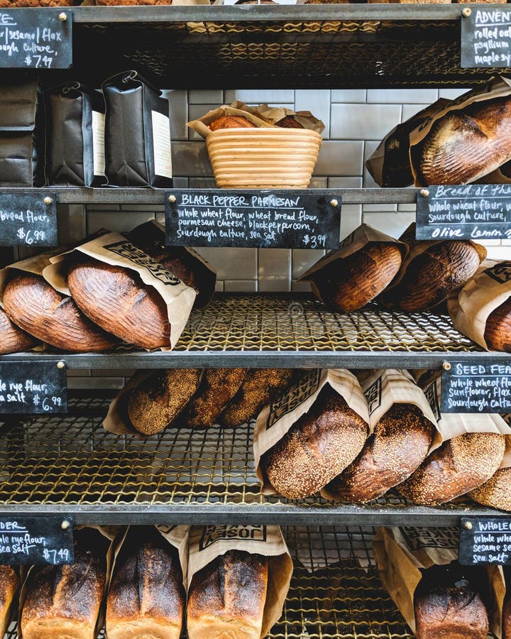 Bread on a Rack in a Bakery Stock Photo - Image of sale, cookware ...