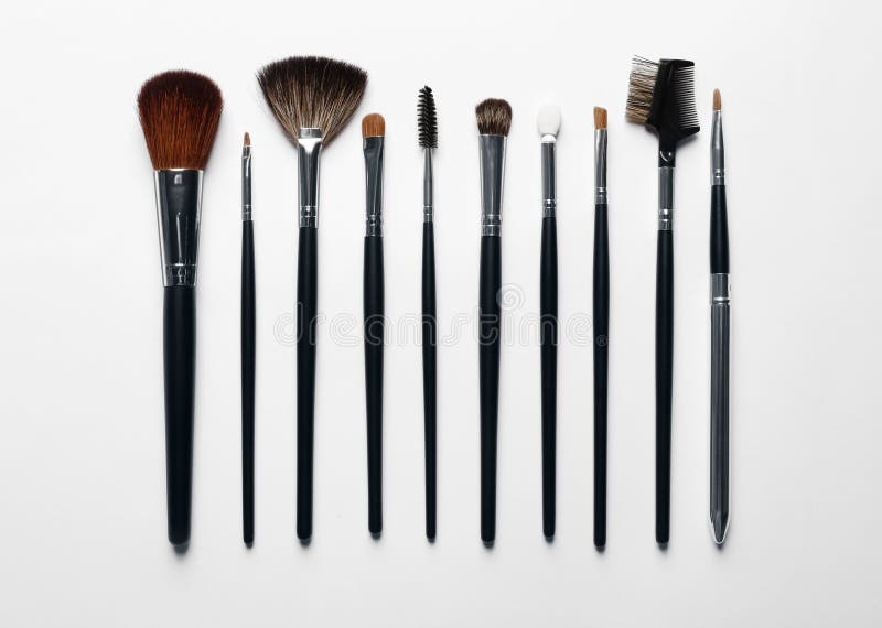 Different Makeup Brushes on Light Blue Background, Flat Lay. Space for ...