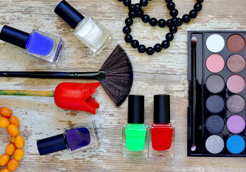 Different Makeup Cosmetics on Rustic White Wooden Table. Stock Photo ...