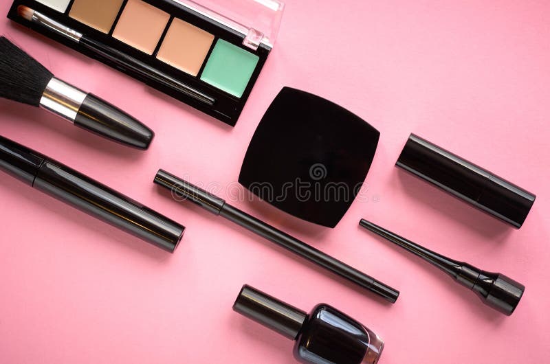 Different Makeup Products Composition on Pink Background Stock Photo ...