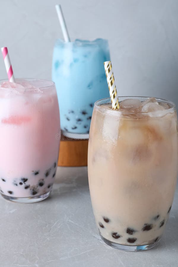 Different Milk Bubble Teas on Light Grey Table Stock Image - Image of ...