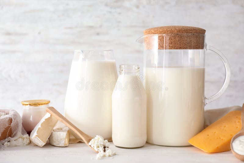 Different Milk Products on Light Table Stock Photo - Image of calcium ...
