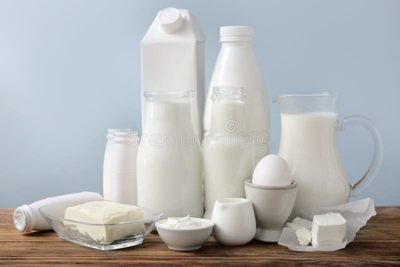 Different Milk Products on Wooden Table Stock Image - Image of milk ...