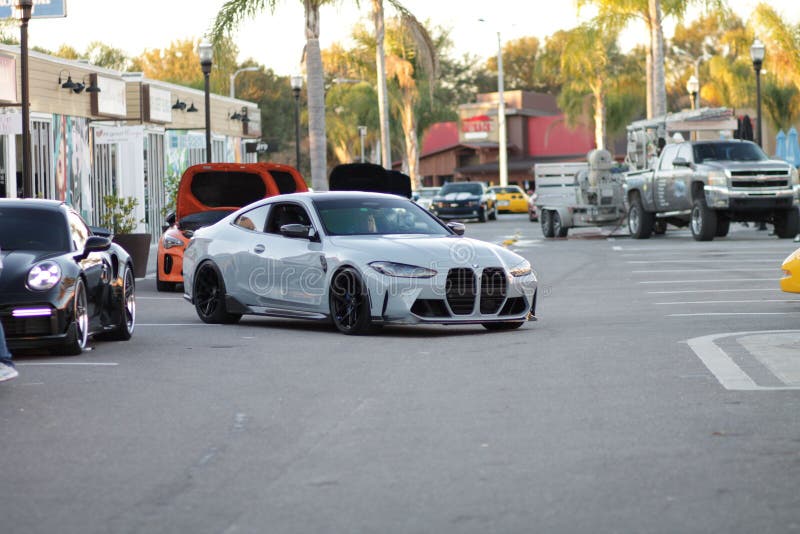 Different Models of Cars in the Street Getting Ready for a Car Show in ...