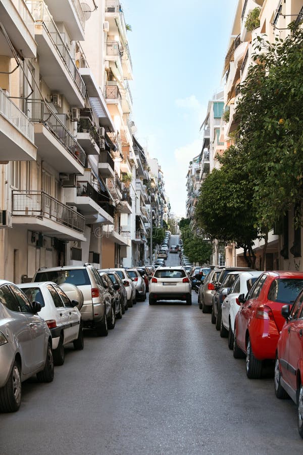 Different Modern Cars Parked on City Street Stock Image - Image of ...