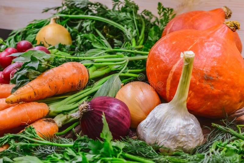 Multi-colored Seasonal Vegetables and Greens Lying on a Table Stock ...
