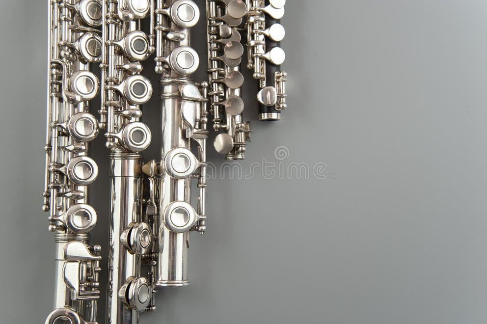 Different Musical Instruments Flute Stacked on a Gray Surface Stock ...