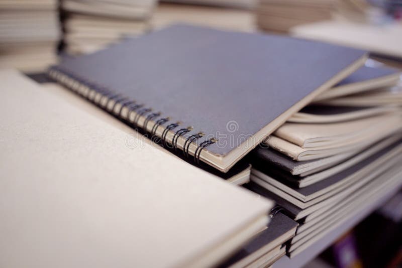 Different Notebooks Lying on the Shelves in the Book Store Stock Photo ...