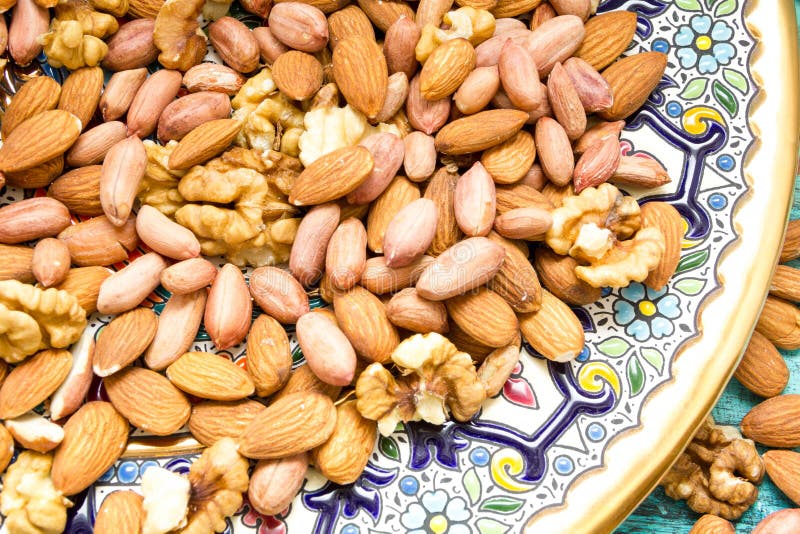 Different Nuts on a Blue Background Stock Image - Image of ingredient ...