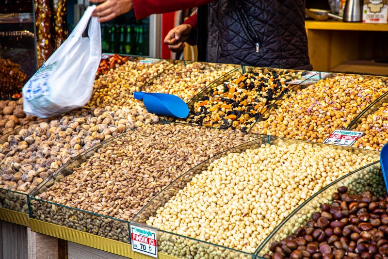 Different Nuts are on the Counter at the Seller in the Market Stock ...