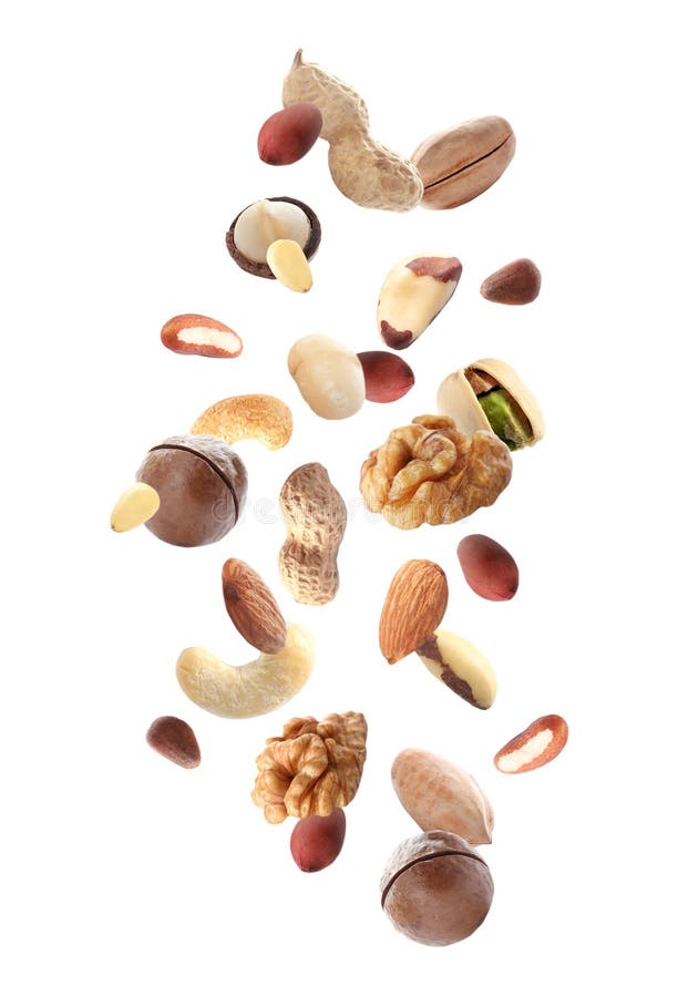 Different Nuts Falling into Pile on Background Stock Image - Image of ...