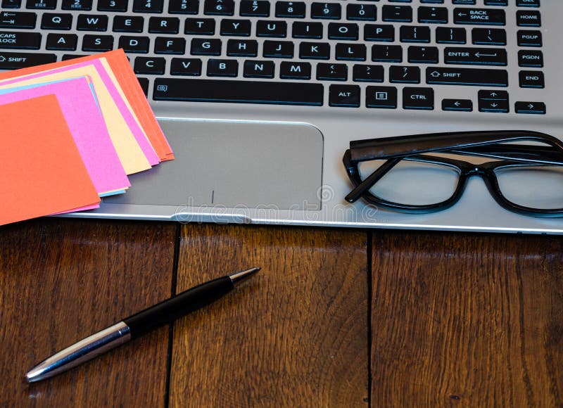 Different Objects on Wooden Office Desk. Modern Wooden Office Desk ...