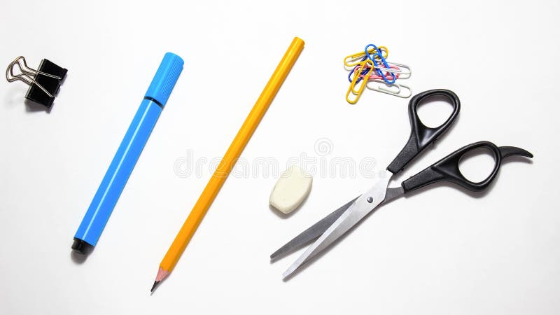 Different Office Stationery Items Move on the White Surface Stock Image ...