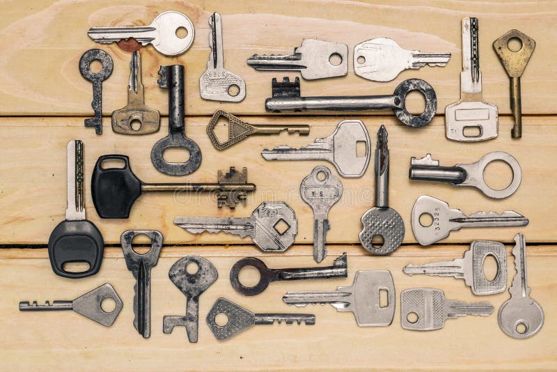 Different Old Keys Randomly Top View on a Wooden Table Stock Image ...