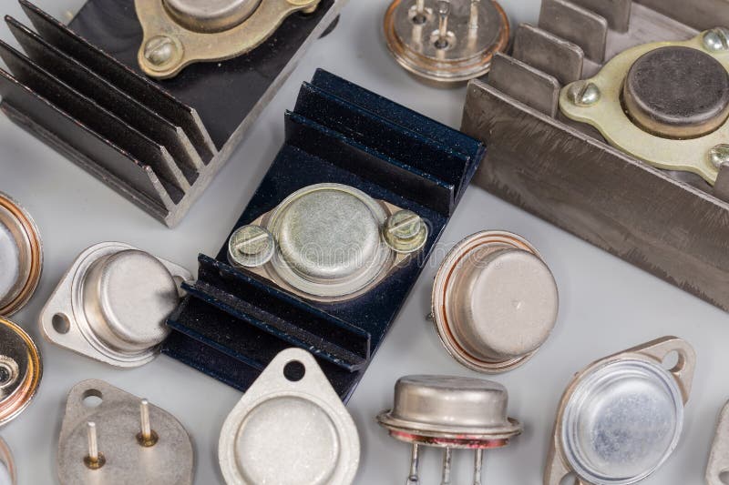 Different Old Power Transistors in Metal Packages on Gray Surface Stock ...