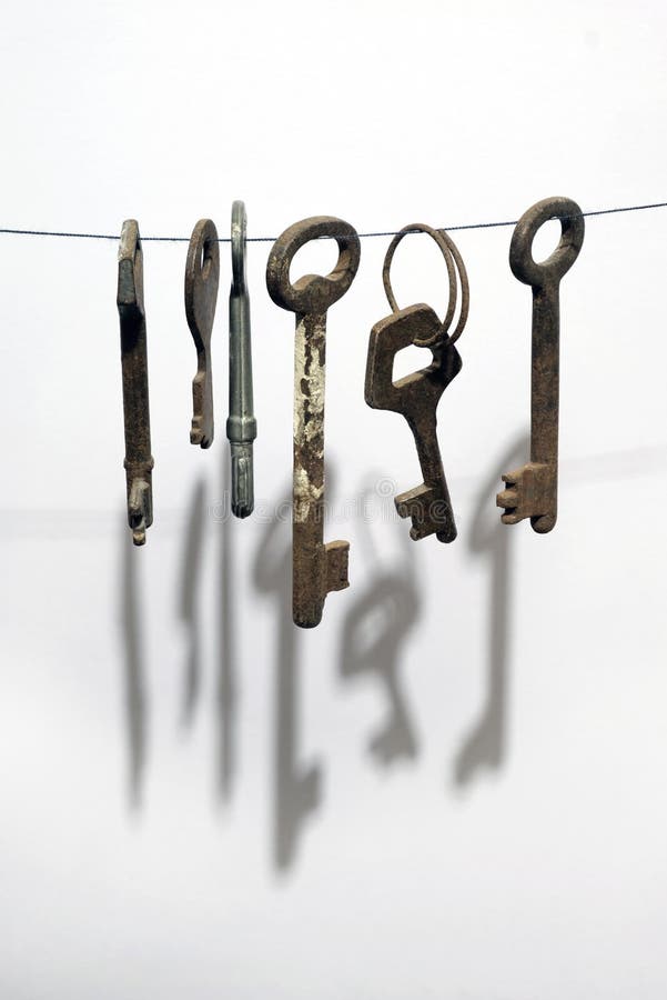 A Different Old Retro Rusty Keys from Different Locks Hanging on String ...