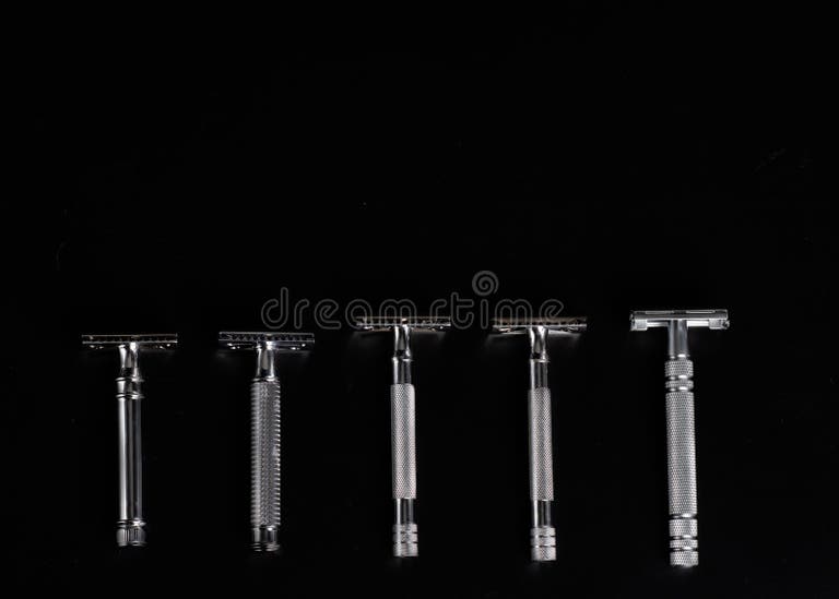 Different Old Vintage Razors and Brush on a Black Background. Stock ...