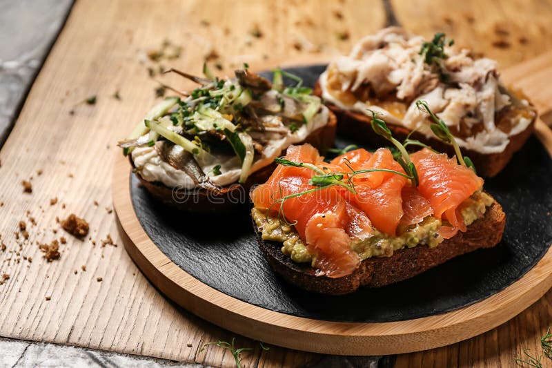 Different Open Sandwiches with Fish on Table Stock Image - Image of ...