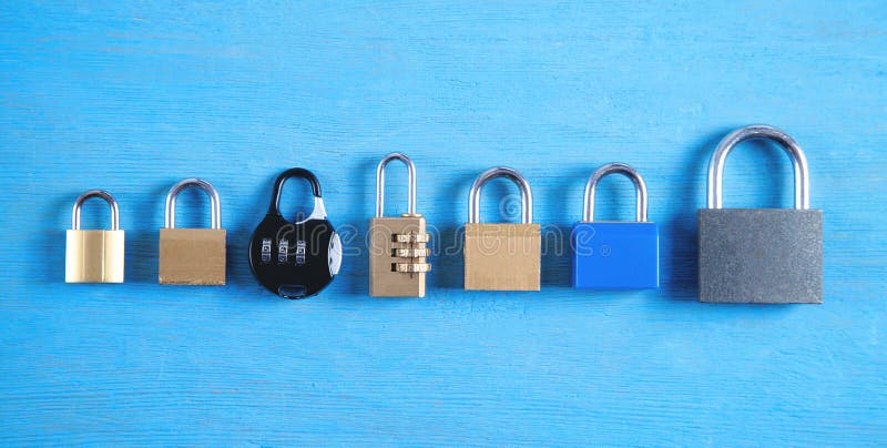 Different Padlocks on the Blue Background Stock Photo - Image of lock ...