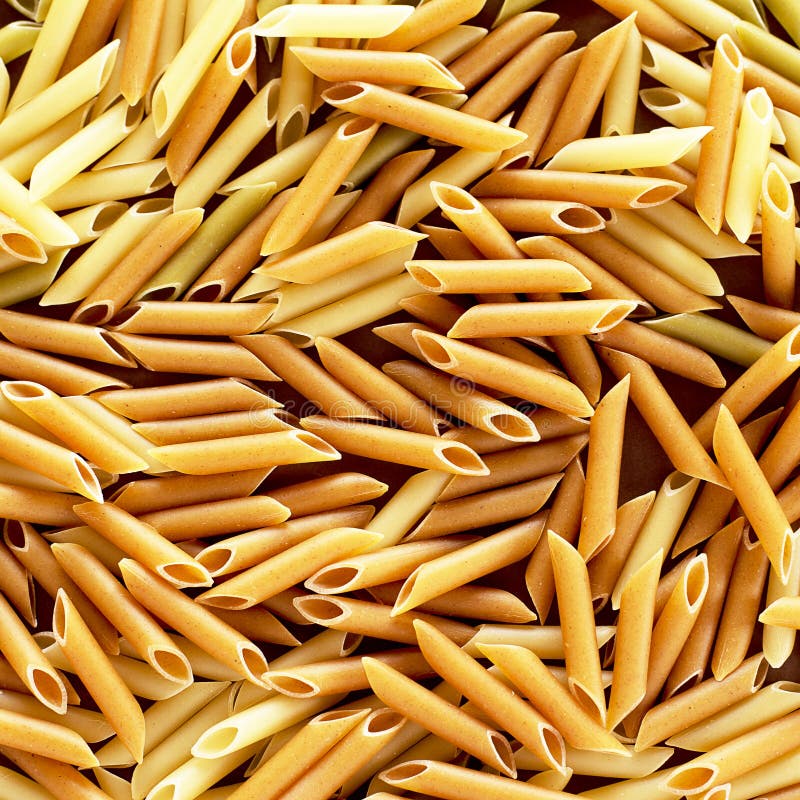Different Pasta in the Form of Tubes of Brown, Yellow and Green Colors ...