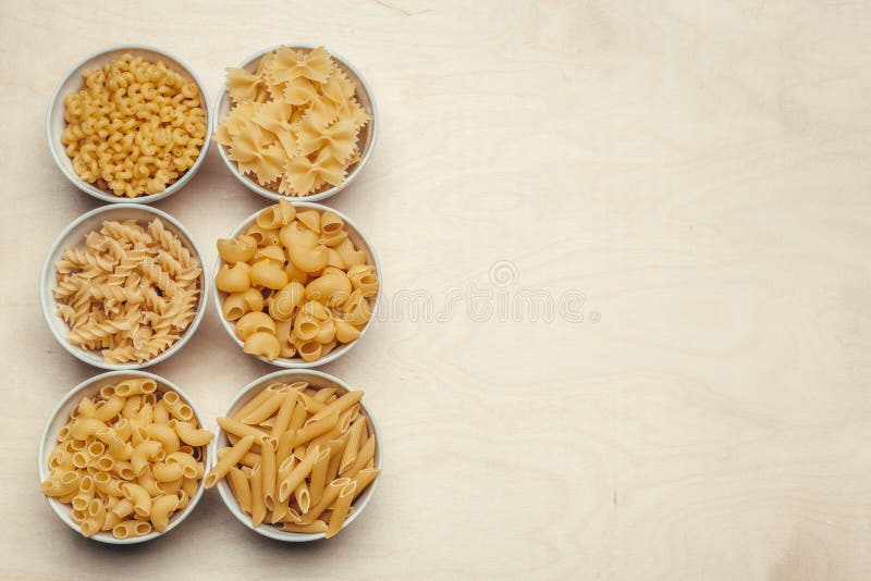Different Pasta Types in Bowls on the Table. Stock Photo - Image of ...