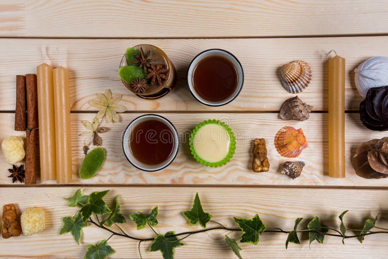 Different Pastries with Tea on a Light Wooden Background. Stock Image ...