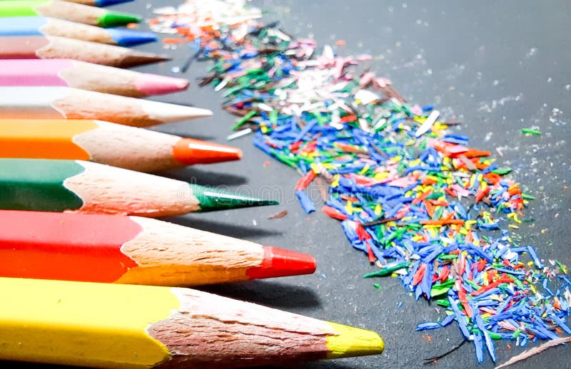 Different Pencil Colors on a Black Drawing Sheet Stock Photo - Image of ...