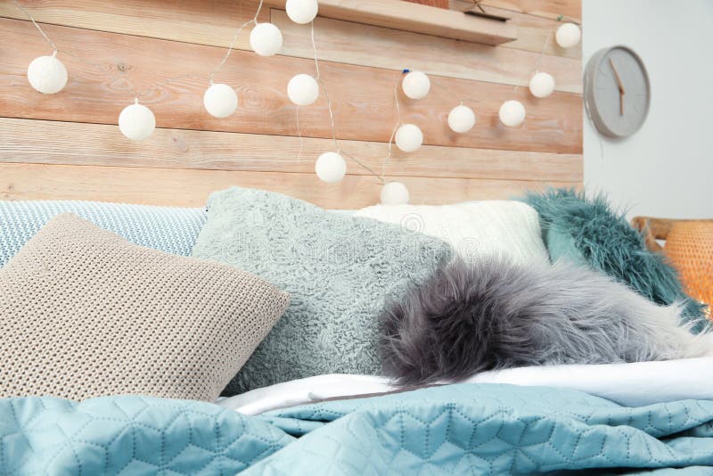 Different Pillows on Bed in Room. Stock Photo - Image of cozy, design ...
