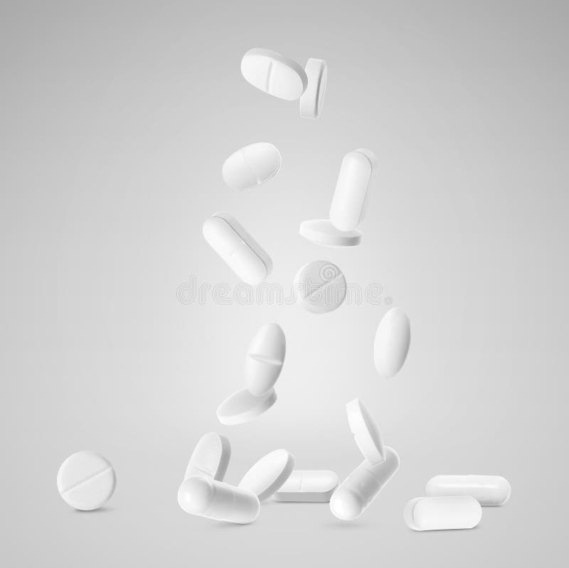 Many Different Pills Falling on Light Grey Background Stock ...