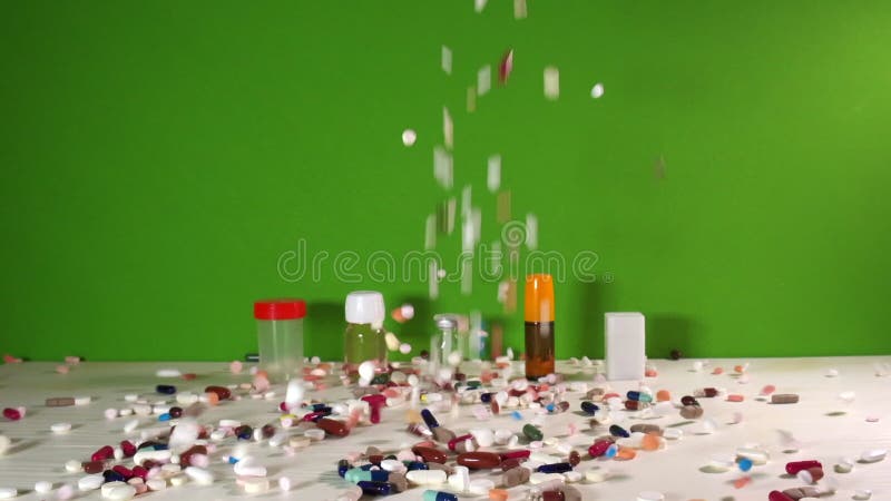 Different Pills Falling on Table. Stock Footage - Video of antibiotic ...