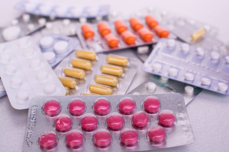 Different Pills in Packs are on the Table. Stock Photo - Image of ...