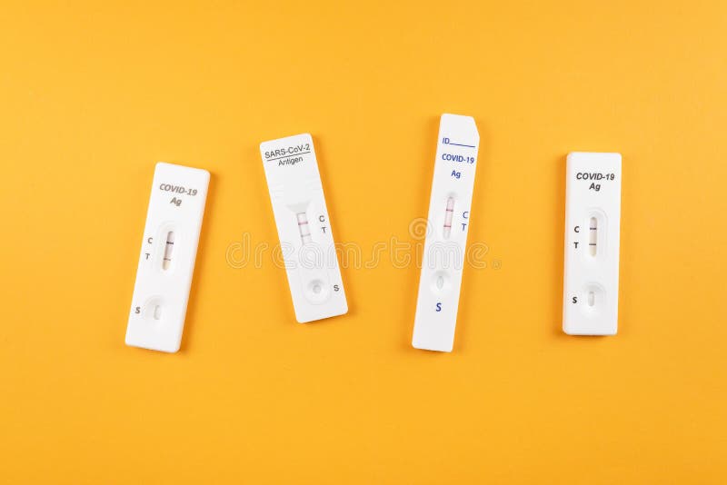 Different Positive Covid-19 SARS-CoV-2 Rapid Tests on Vivid Orange ...