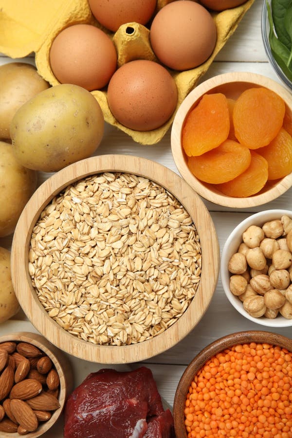 Different Products Rich in Iron on White Wooden Table, Flat Lay. Diet ...