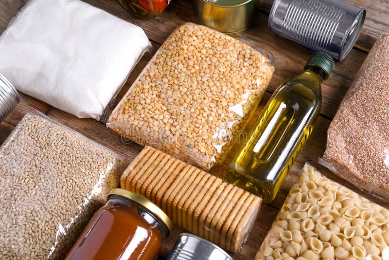 Different Products on Wooden Table. Food Donation Stock Image - Image ...