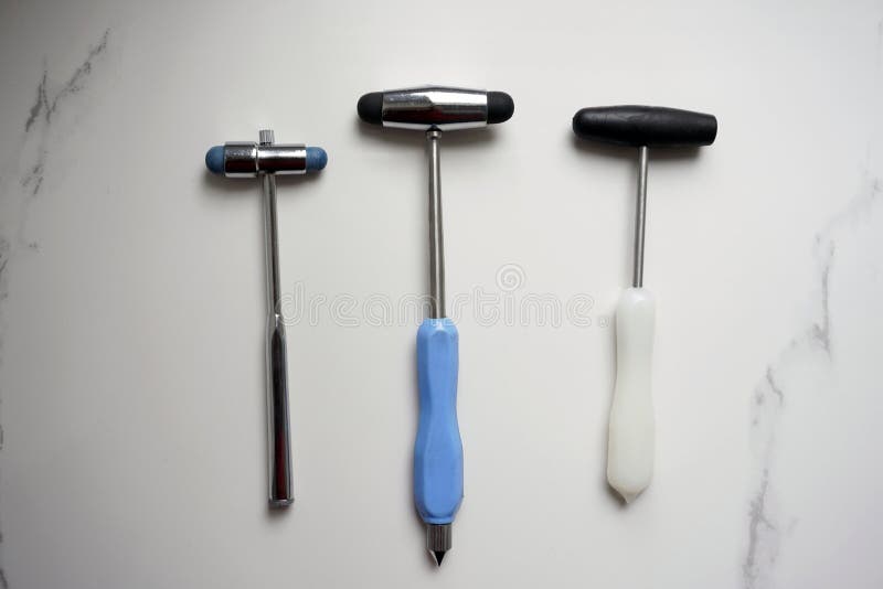 Different Reflex Hammers on a Marble Background Stock Image - Image of ...