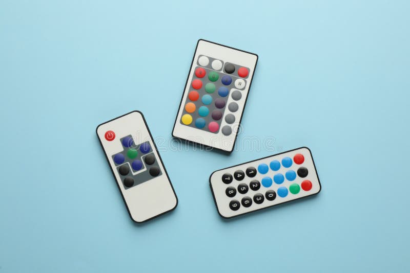 Different Remote Controls on Light Blue Background, Flat Lay Stock ...