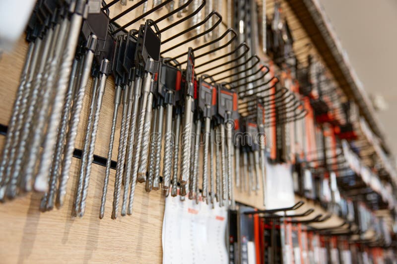Different Replaceable Drill Consumable Tools on Hardware Store Showcase Stock Photo - Image of ...