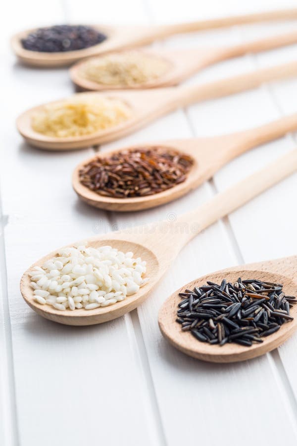 Different rice varieties. stock photo. Image of spoon - 77526520