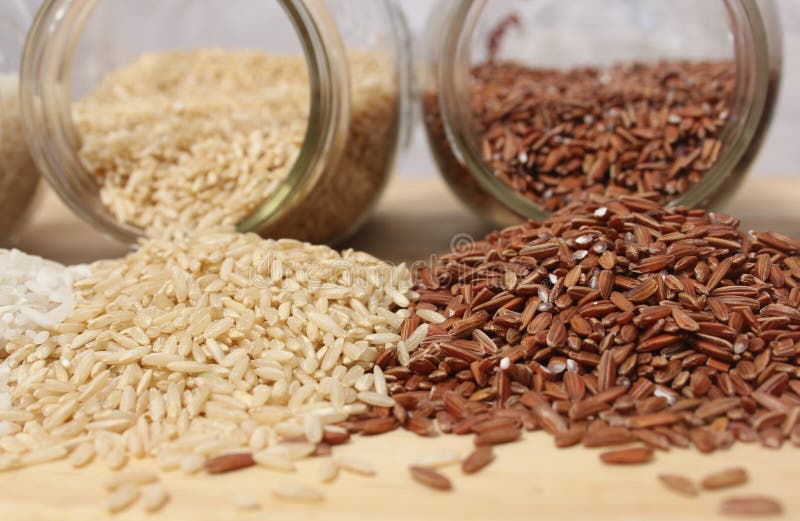 Different Rice Varieties in Rustic Kitchen. Stock Photo - Image of ...