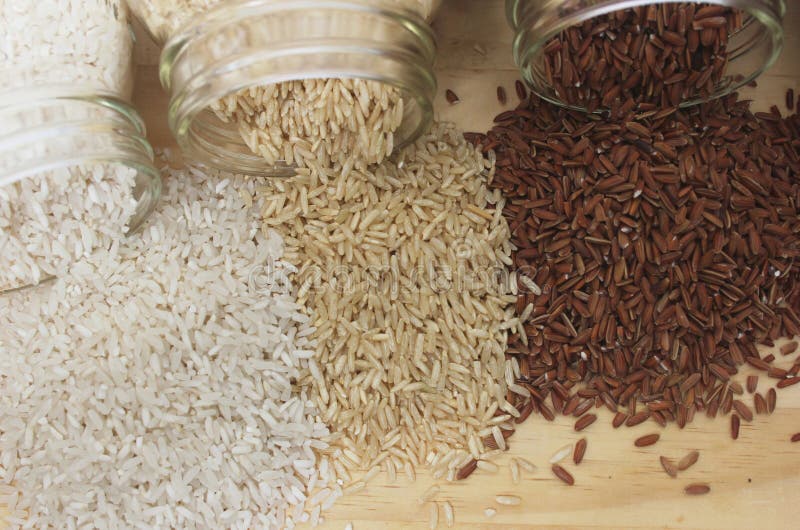 Different Rice Varieties in Rustic Kitchen. Stock Photo - Image of rice ...