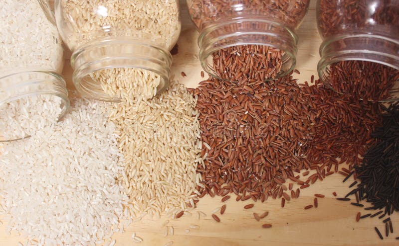 Different Rice Varieties in Rustic Kitchen. Stock Image - Image of ...
