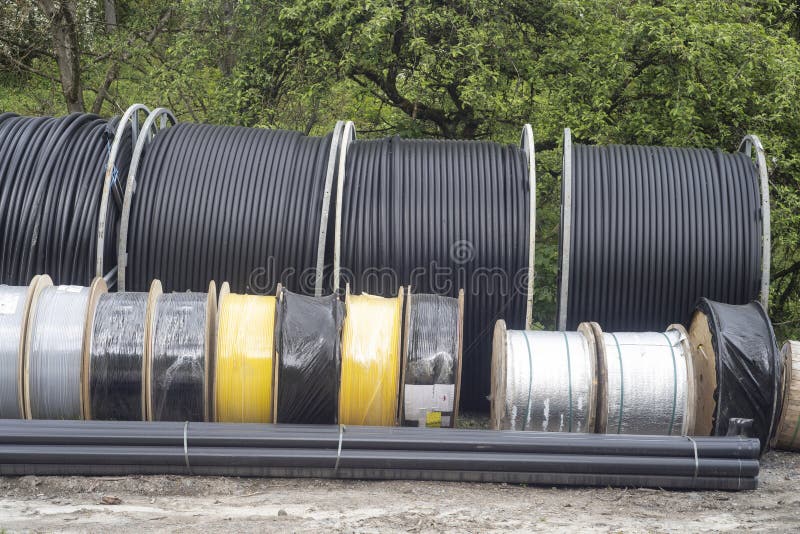 Different Rolls of Telecommunication Cable Coiled Up on Construction ...