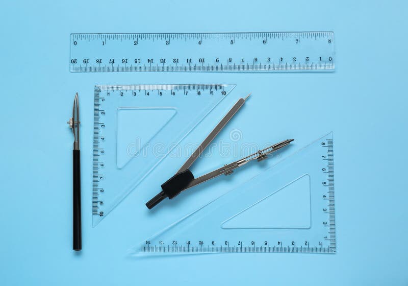Different Rulers and Compass on Light Blue Background, Flat Lay Stock ...