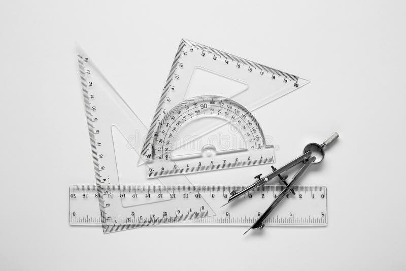 Different Rulers and Compass on White Background, Top View Stock Image ...