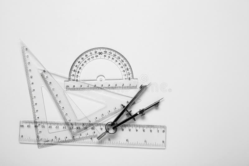 Different Rulers and Compass on White Background, Top View Stock Image ...