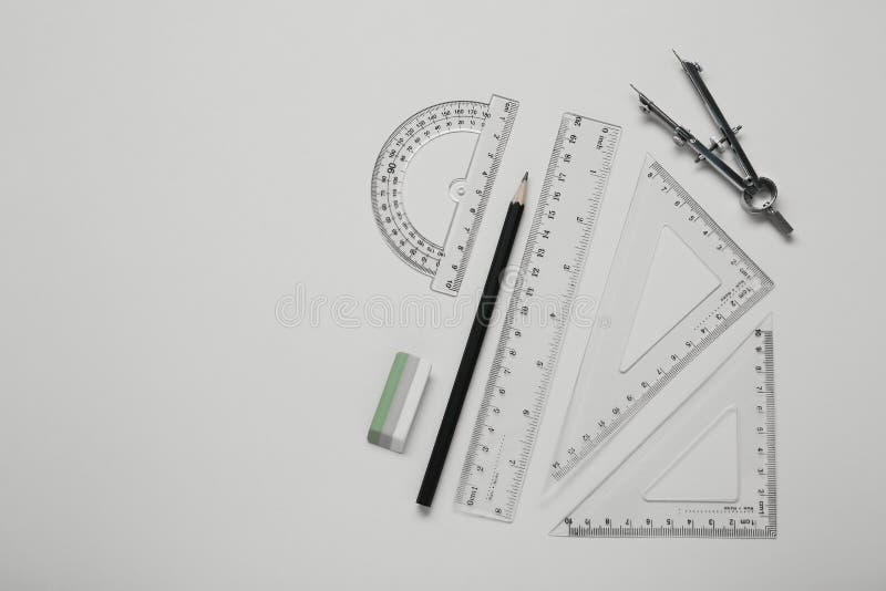 Different Rulers and Compass on Light Blue Background, Flat Lay Stock ...