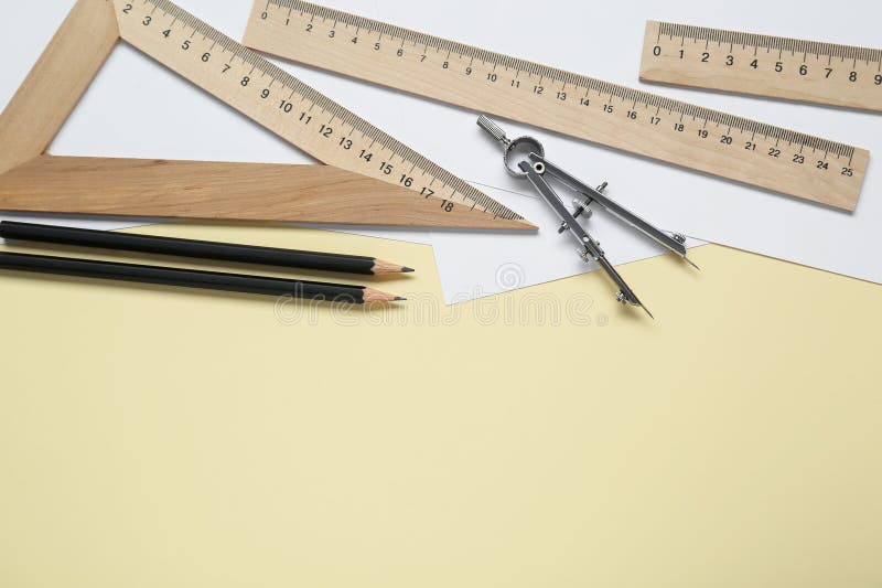 Different Rulers, Pencils and Compass on Yellow Background, Flat Lay ...