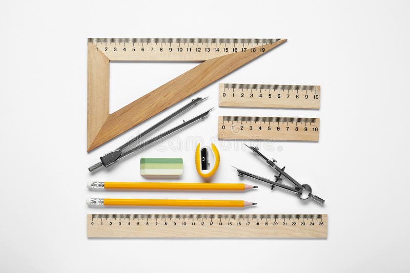 Different Rulers, Pencil, and Compass on Yellow Background. Space for ...