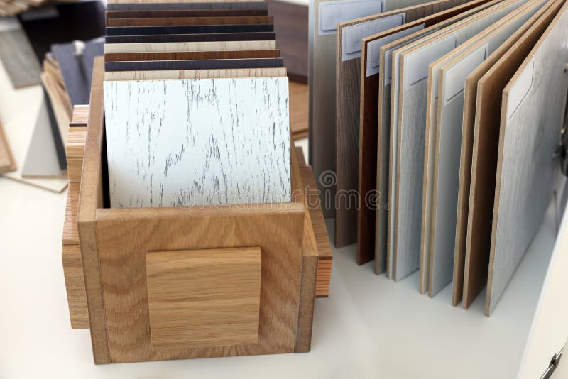 Different Samples of Wooden Flooring on White Table Stock Photo - Image ...